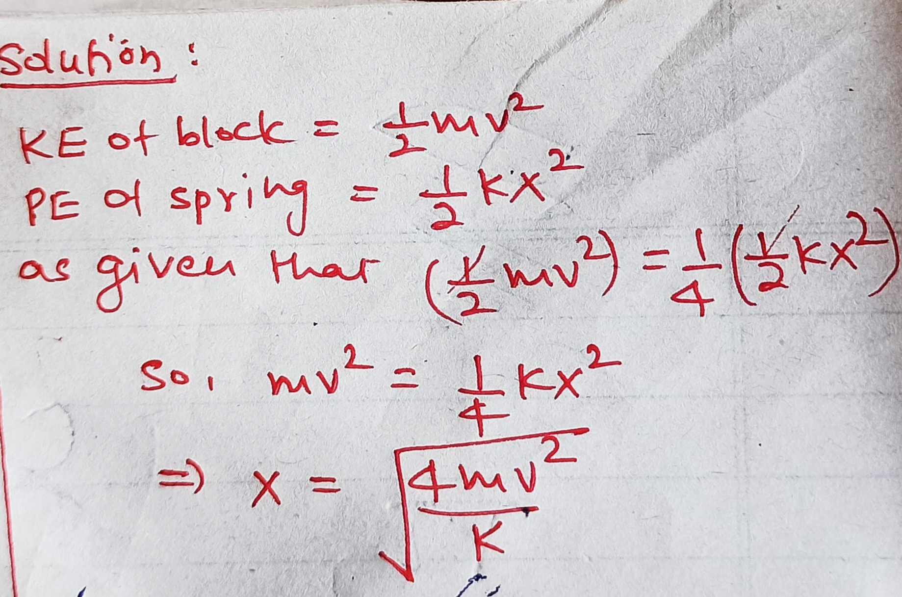 Calculate the compression of the spring at that moment when kinetic ...